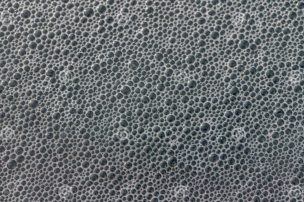 Bubbles Forming an Intricate Pattern on a Surface during a Creative ...