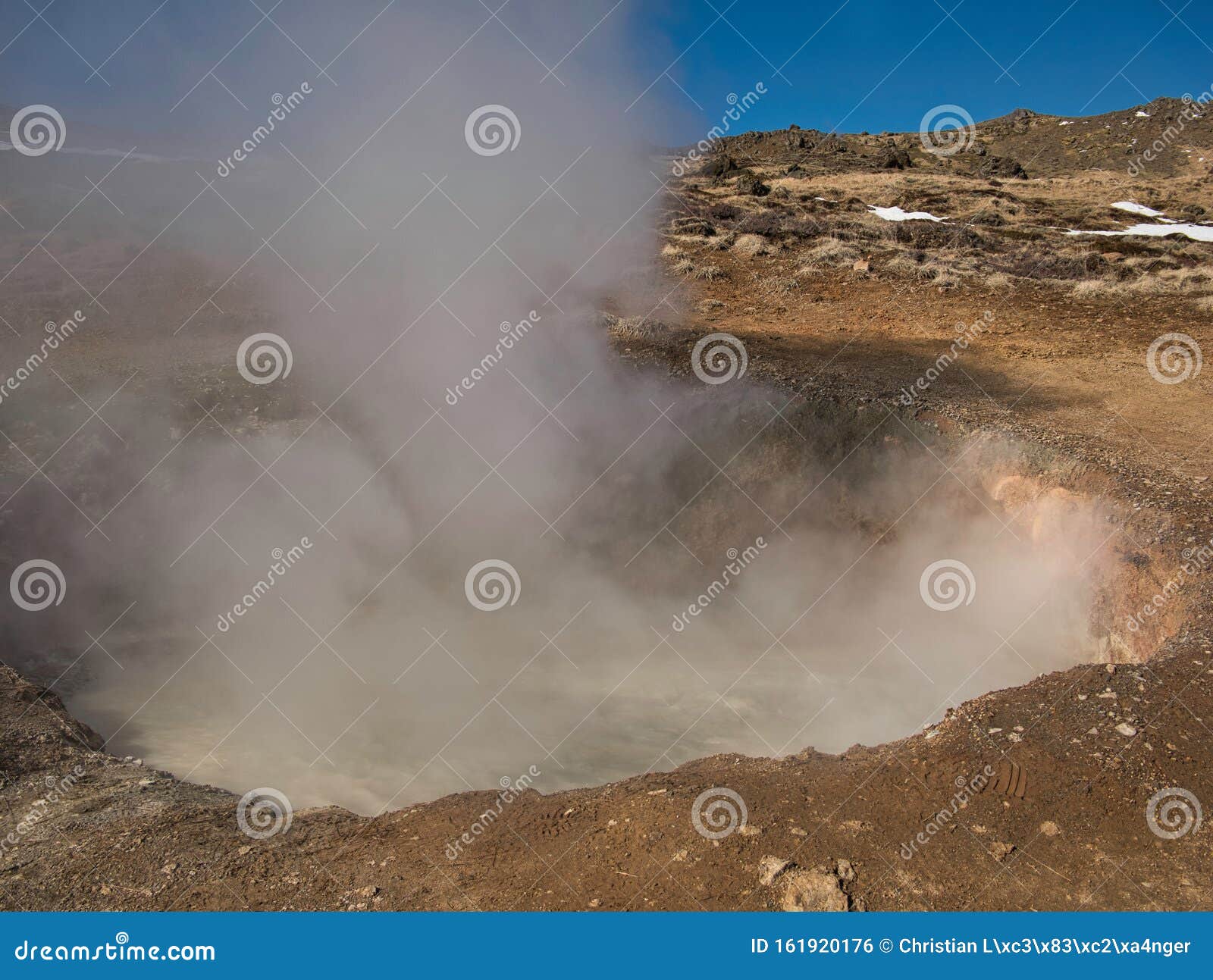 A Bubbling Mud Pot in the Mountains of Iceland Stock Photo - Image of ...