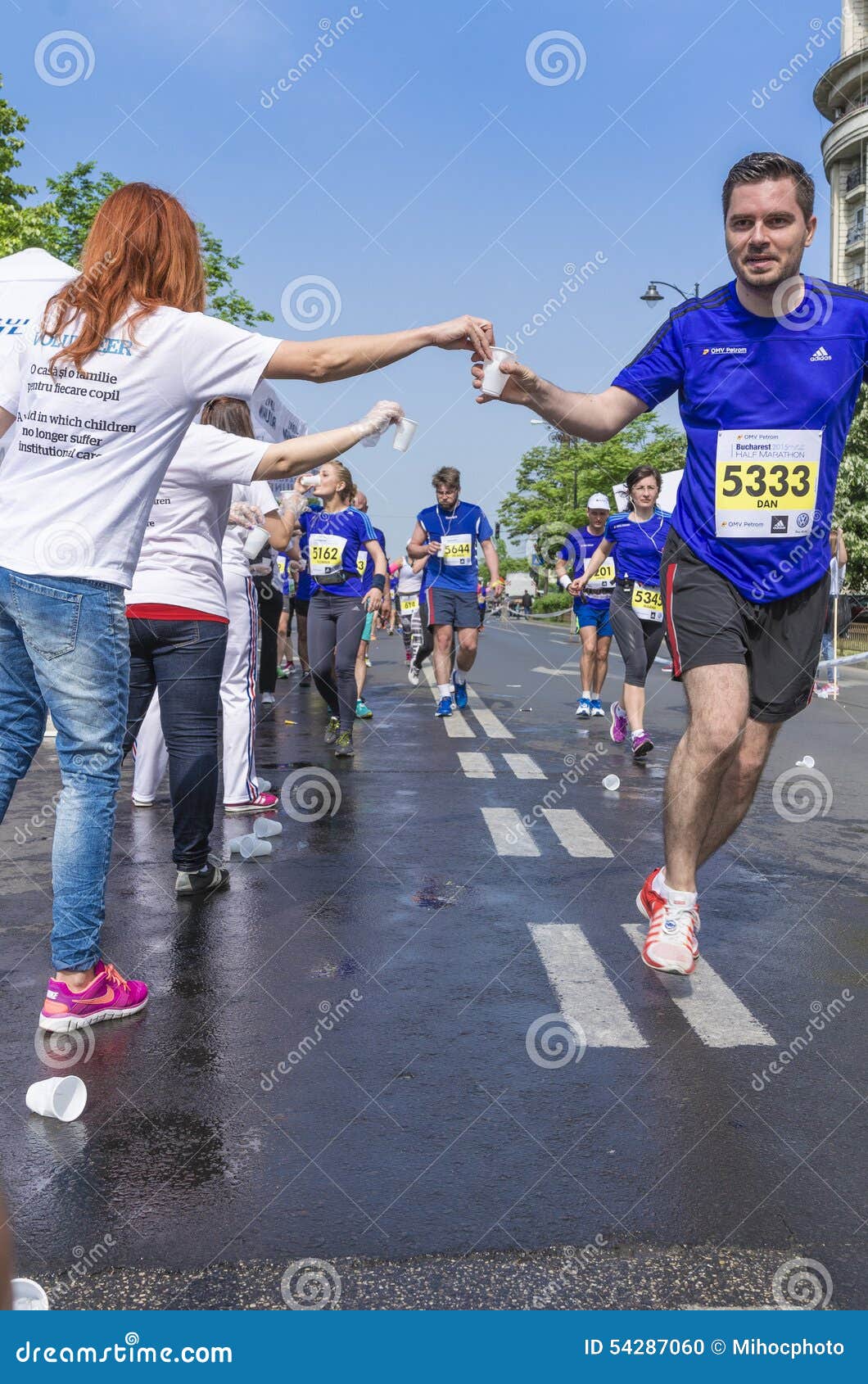 Marathon Runner Picking Up Water at Service Point Editorial Image ...