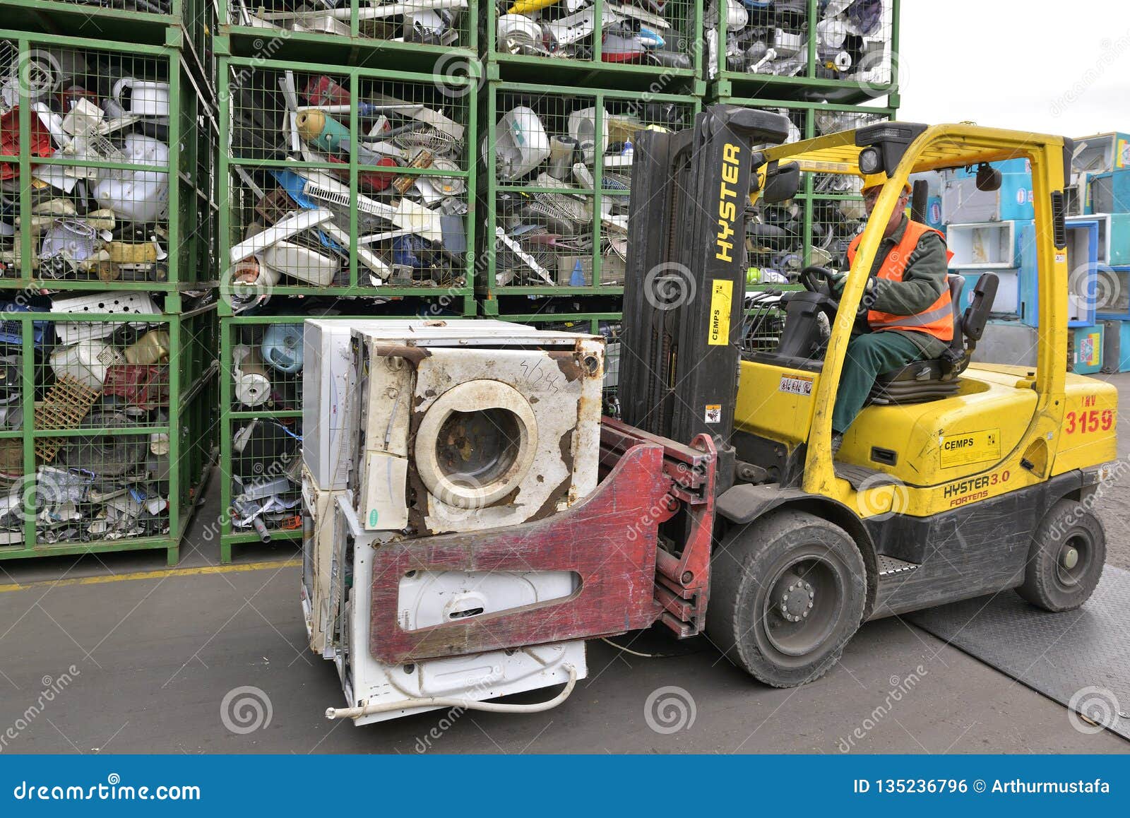 Bucharest, Romania - October 2013: Worker Moving Electronic Waste from ...