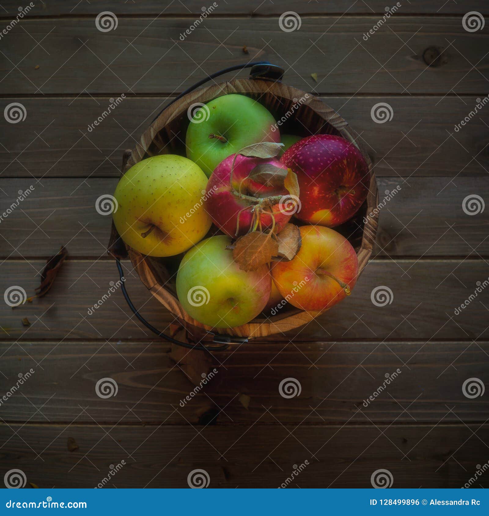 Bucket of Assorted Apples Turned Over Stock Photo - Image of group ...