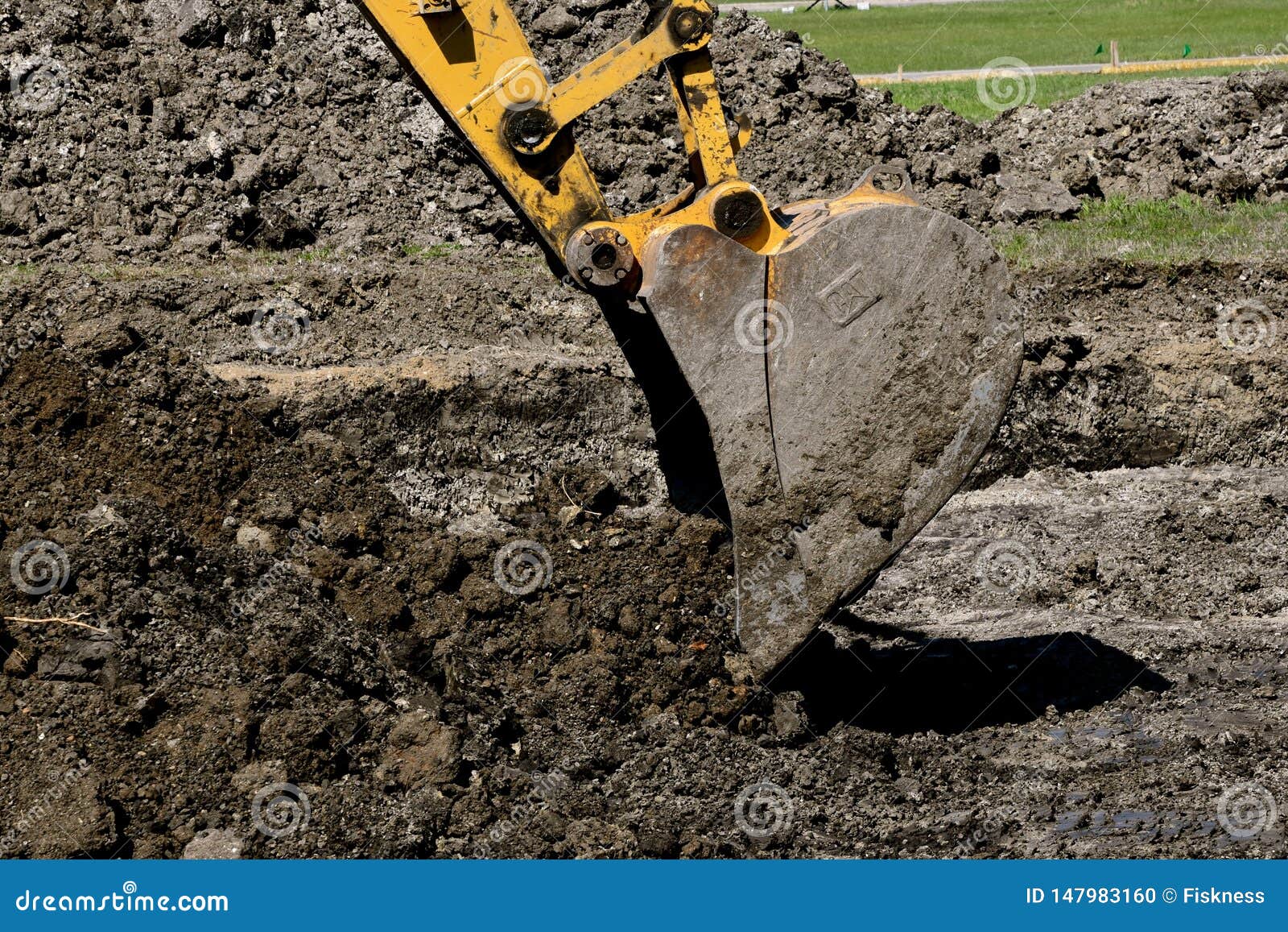 Bucket from a Backhoe Scrapes of a Load of Earth Stock Photo - Image of ...
