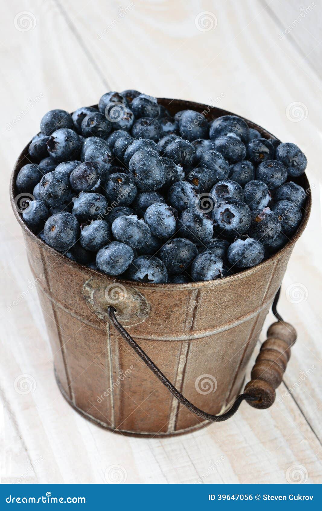Bucket of Blueberries on Rustic Table Stock Photo - Image of wood ...
