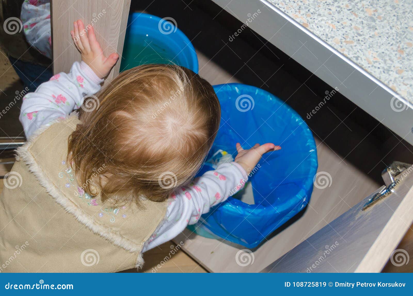 In a Bucket of Cleaning Out the Garbage Child Stock Image - Image of ...