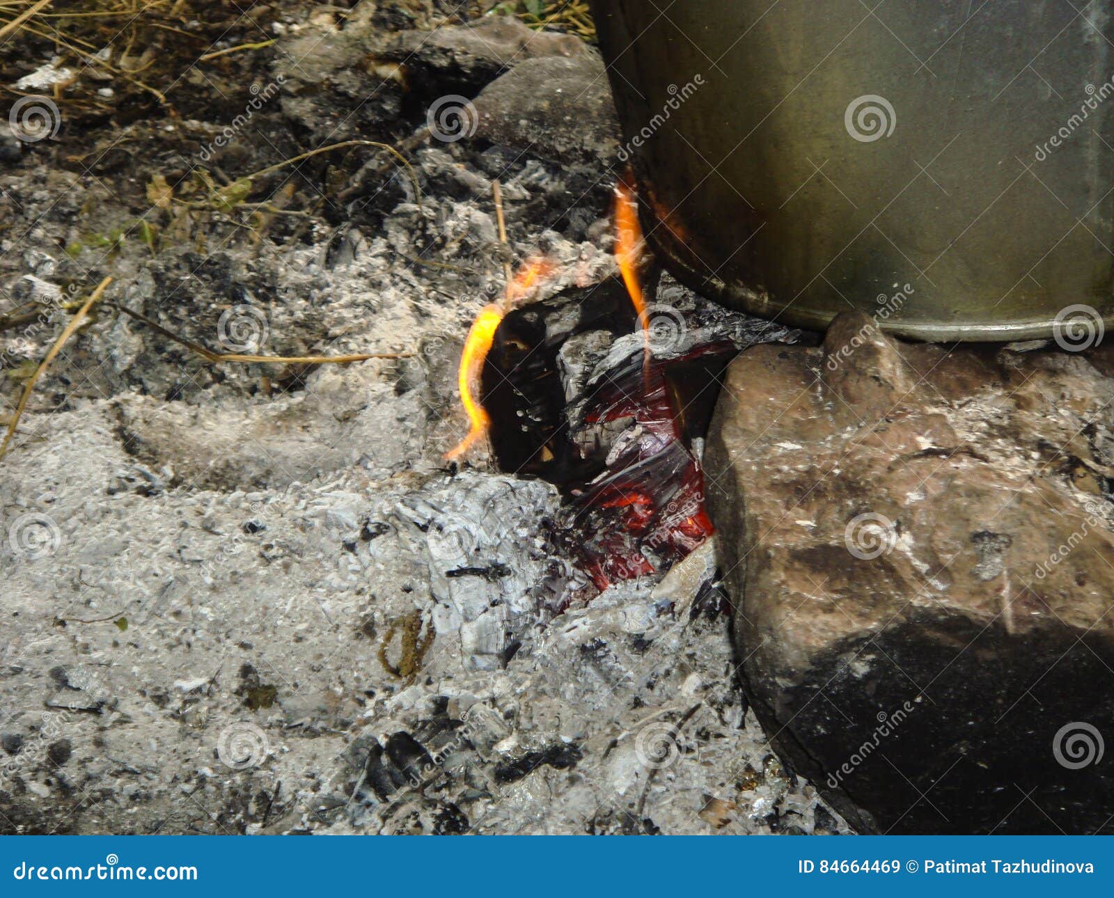 A Bucket on a Fire in the Forest Stock Image - Image of heat, action ...