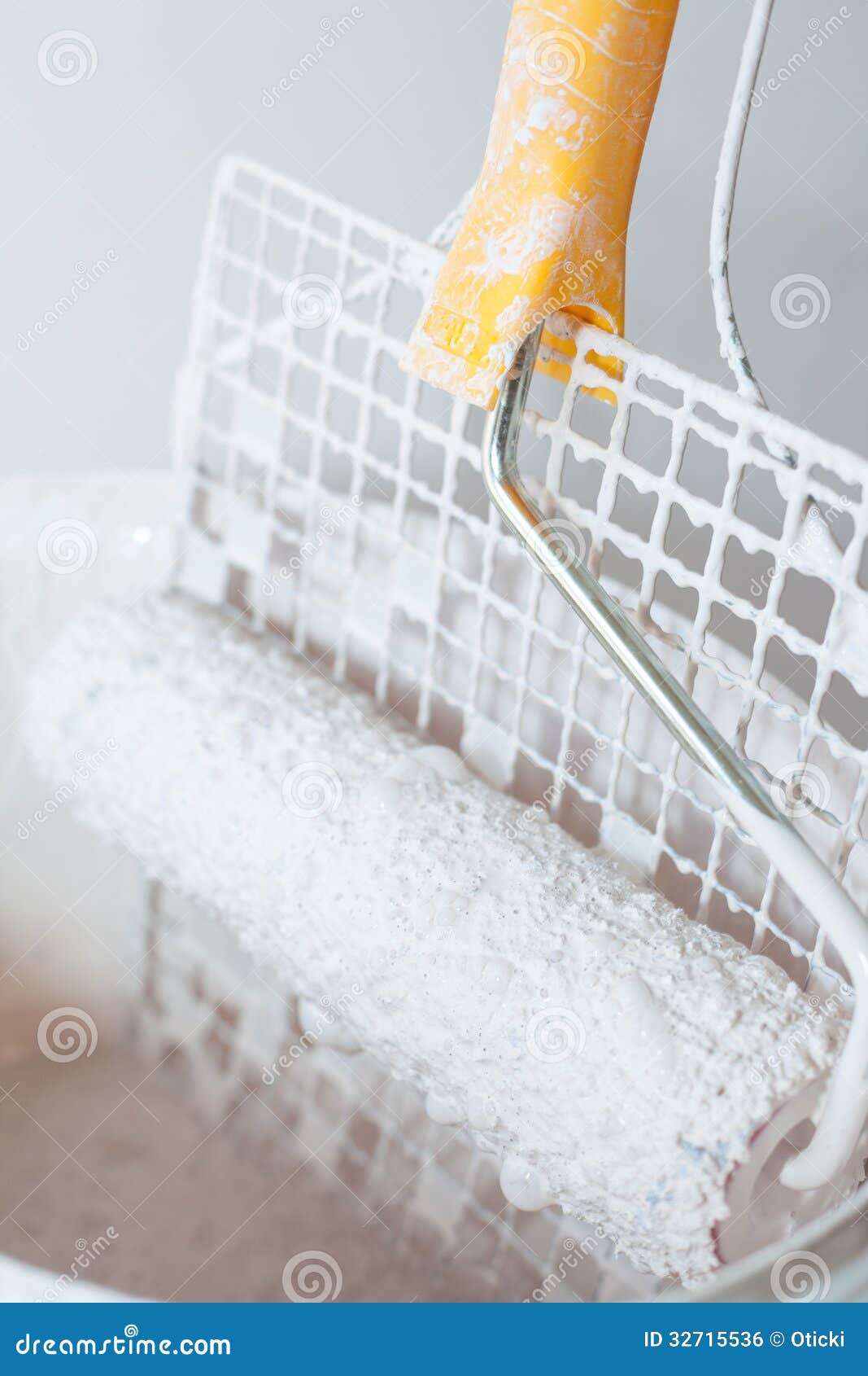 Bucket Full of Paint with Paint Roller on it Stock Photo - Image of ...