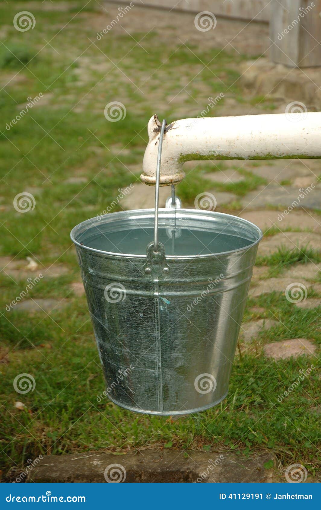 Bucket full of water stock image. Image of cobblestone - 41129191