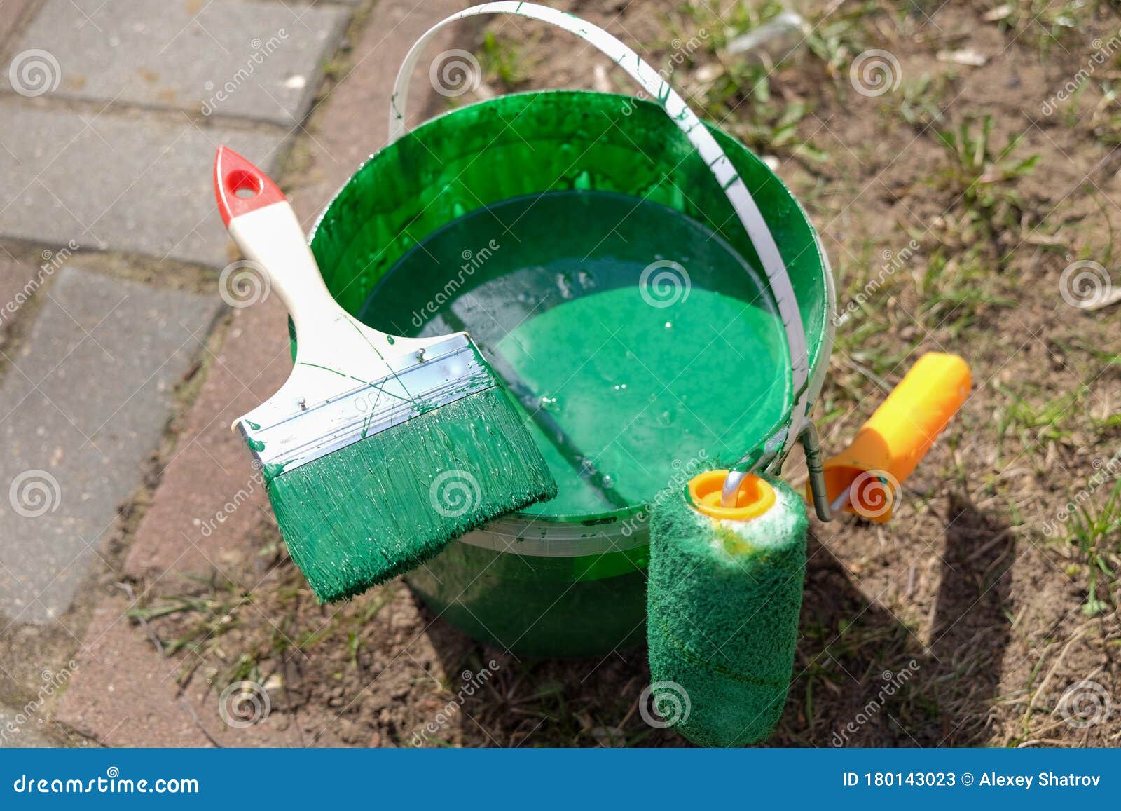 A Bucket of Green Paint and a Paintbrush Stock Image - Image of concept ...