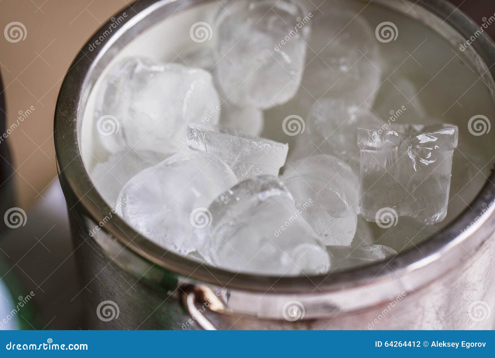 Bucket with ice cubes stock photo. Image of container - 64264412