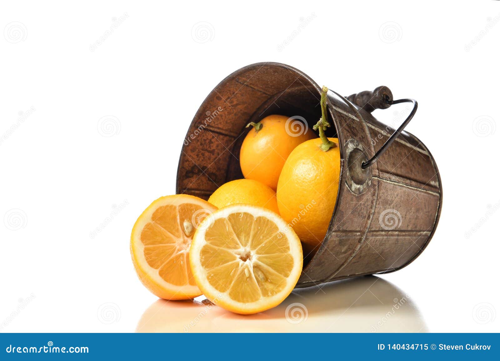 A Bucket on Its Side with Fresh Picked Lemons Stock Image - Image of ...