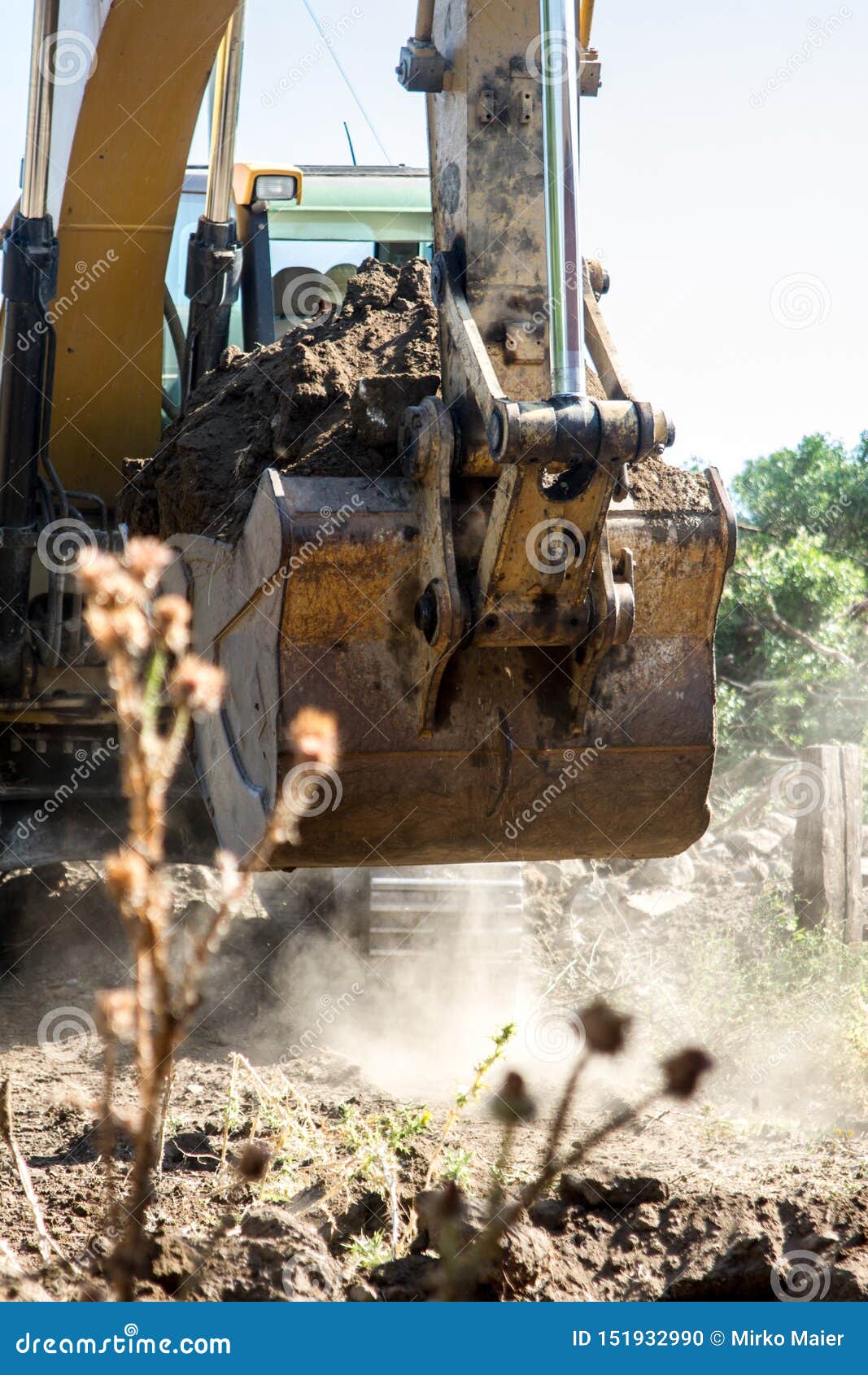 Bucket and Mechanical Arm of the Excavator in Motion Stock Photo ...