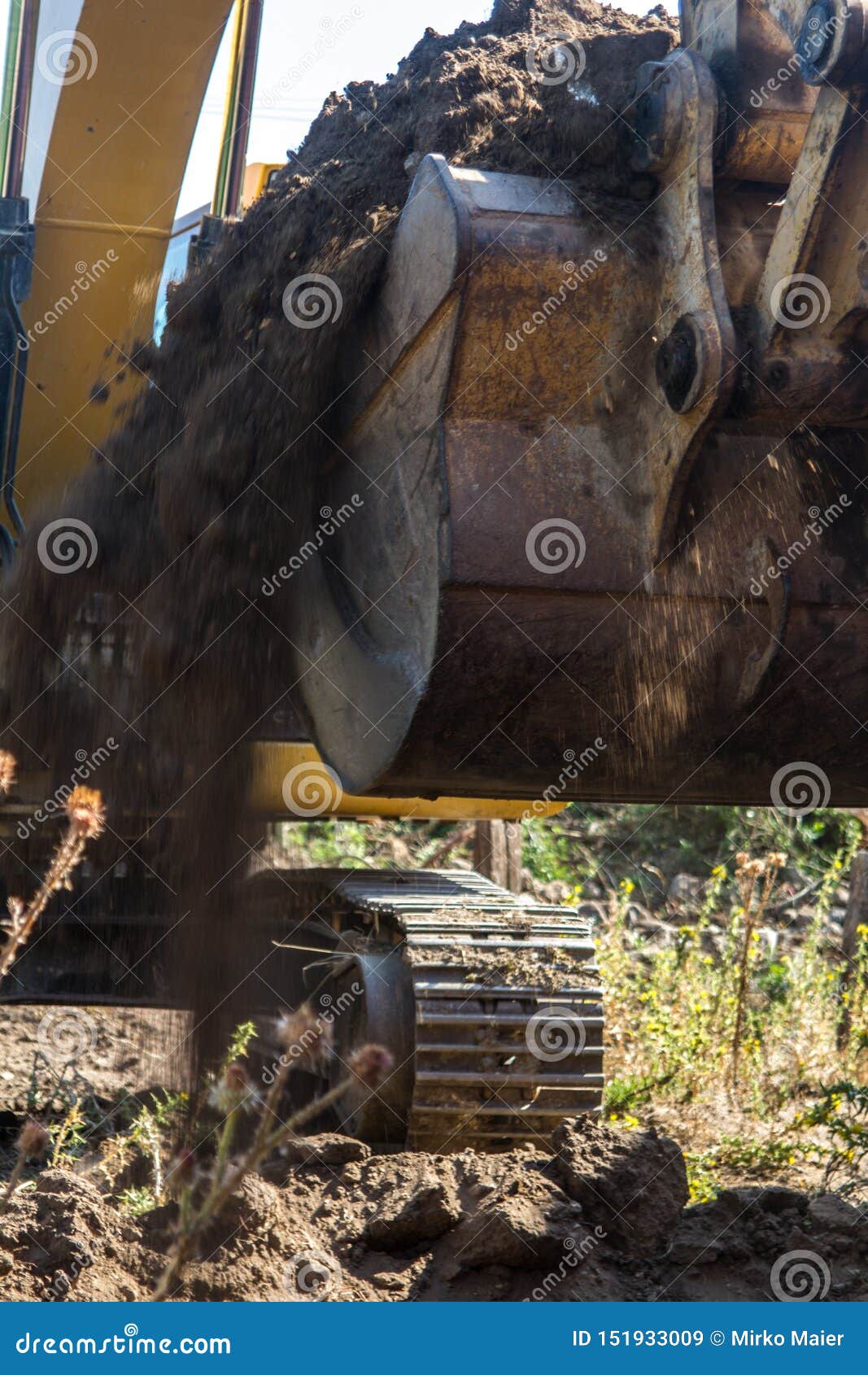 Bucket and Mechanical Arm of the Excavator in Motion Stock Image ...
