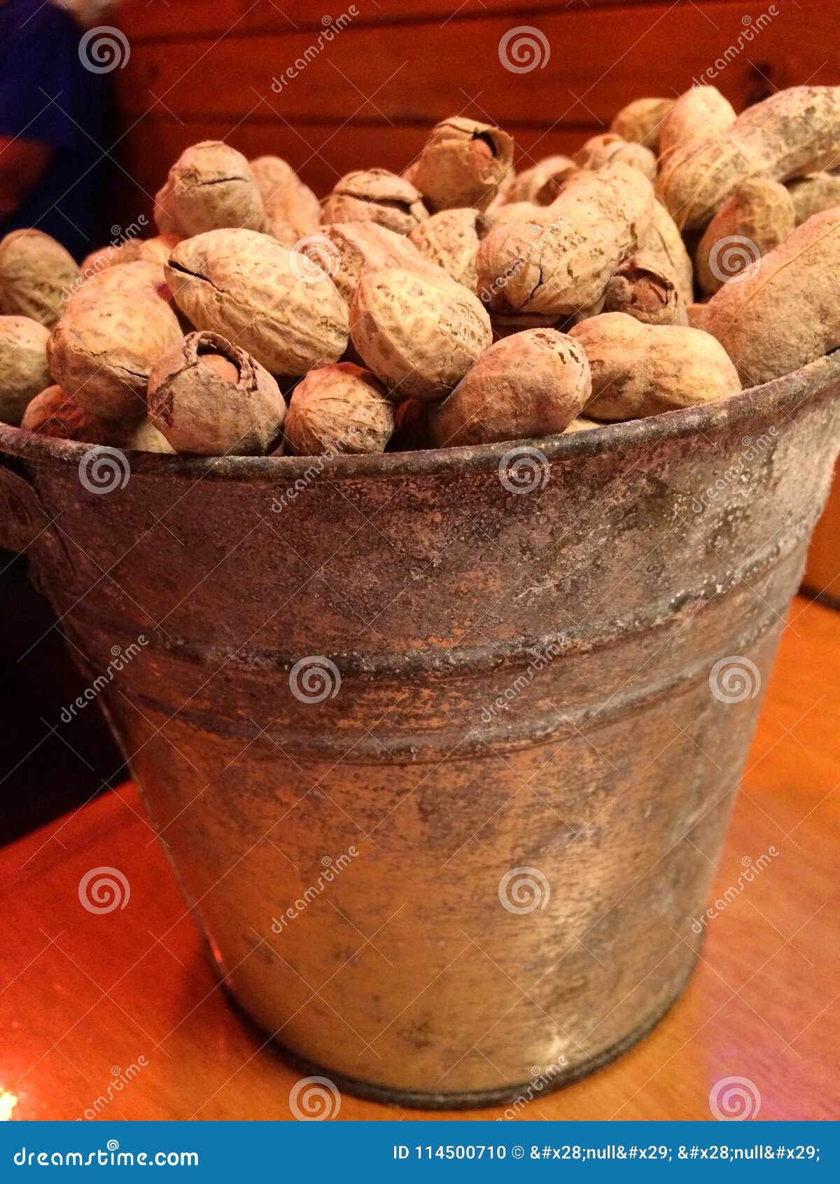 A bucket of peanuts stock photo. Image of overeating - 114500710