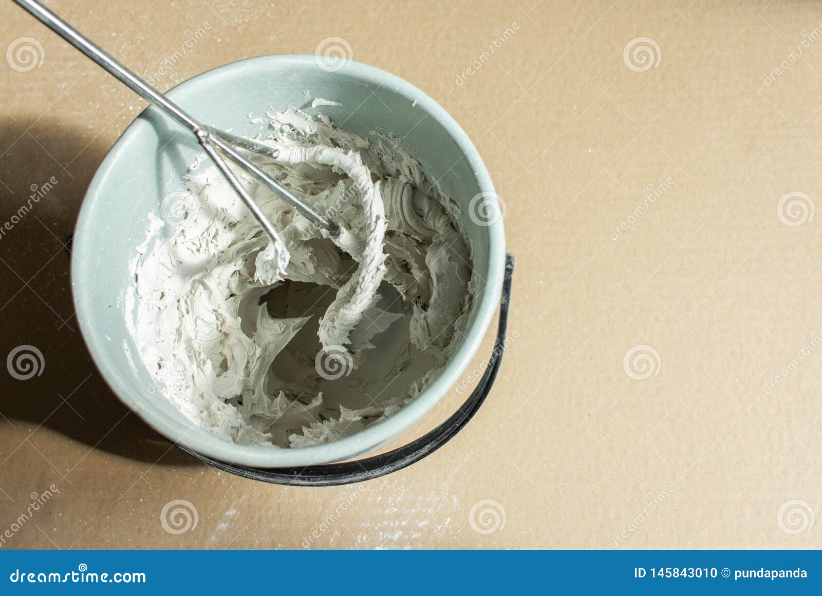 Bucket with ready putty stock photo. Image of overhauls - 145843010