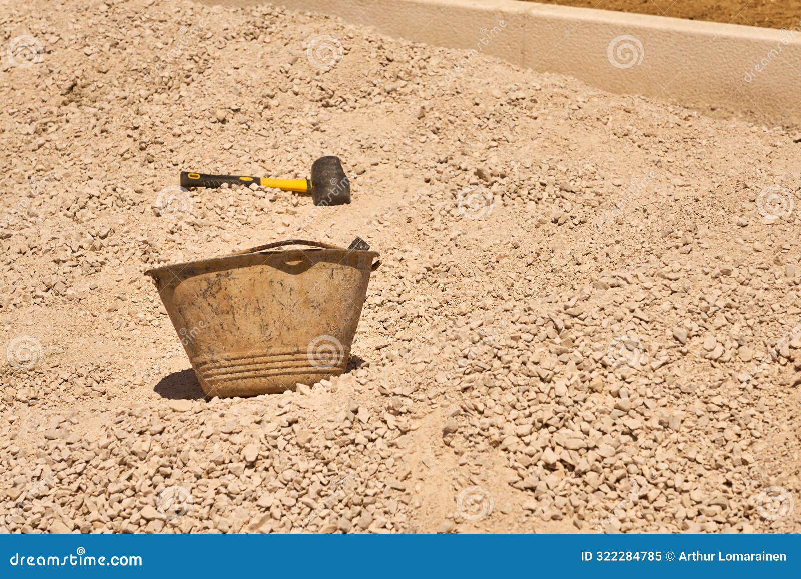 A Bucket and a Rubber Hammer on the Sand. Stock Image - Image of ...