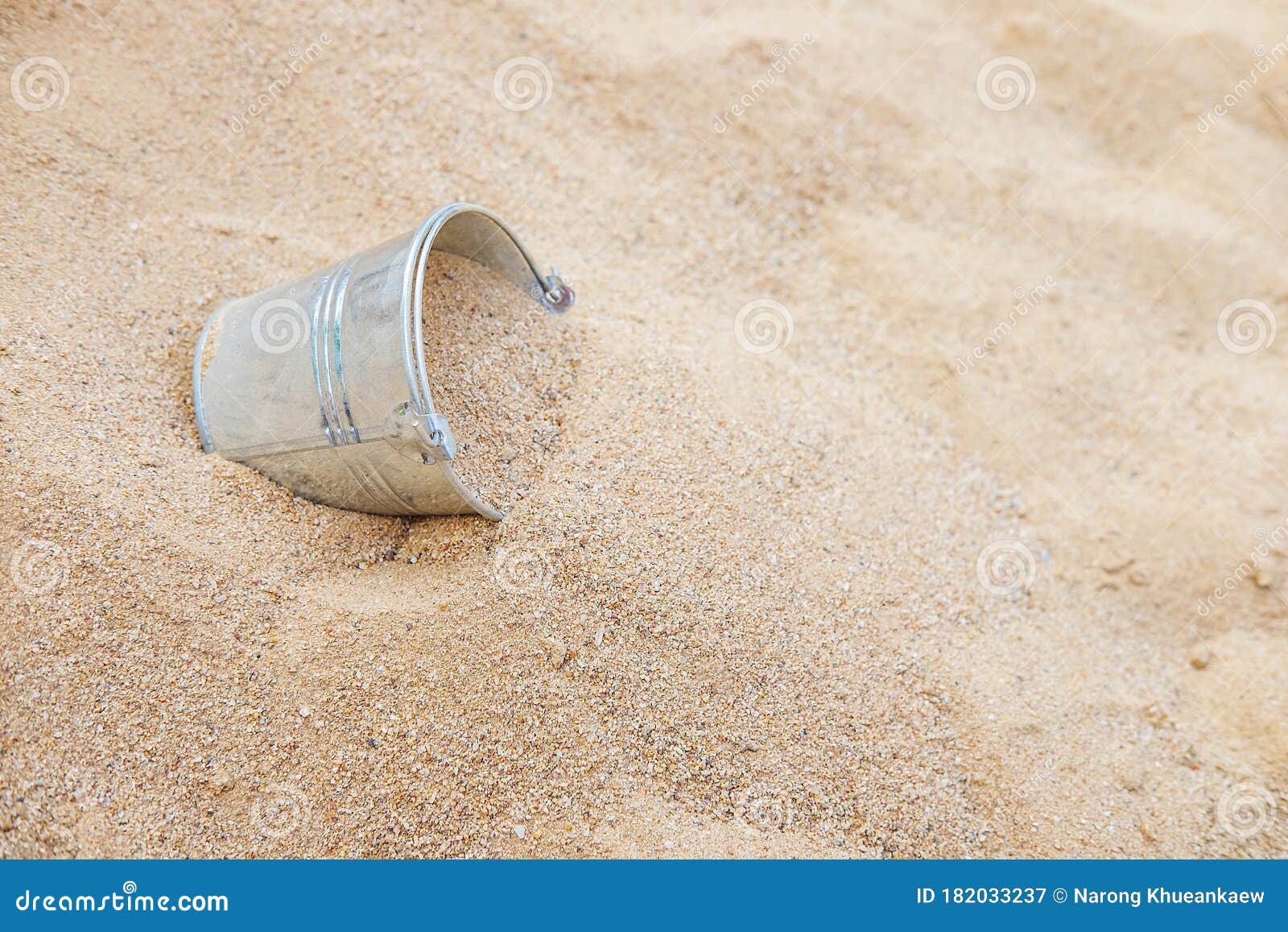 Bucket in the sand pile stock image. Image of bottom - 182033237