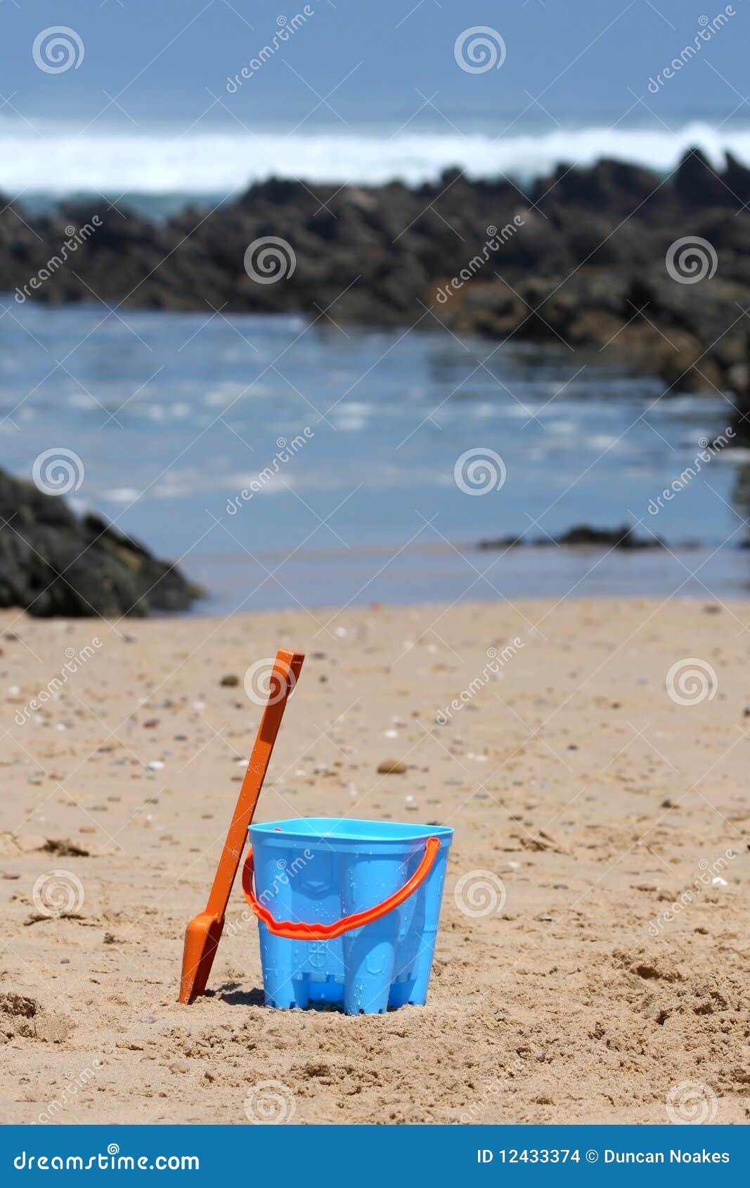 Bucket and Spade at Seashore Stock Photo - Image of outdoor, space ...