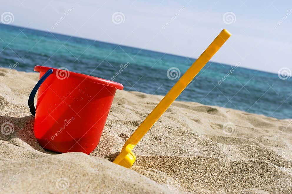 Bucket and spades stock image. Image of spades, water, shore - 902219