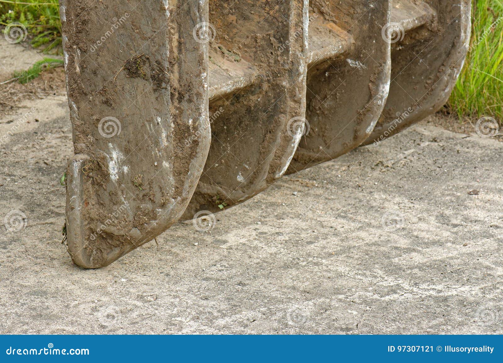 Bucket teeth on ground stock image. Image of control - 97307121