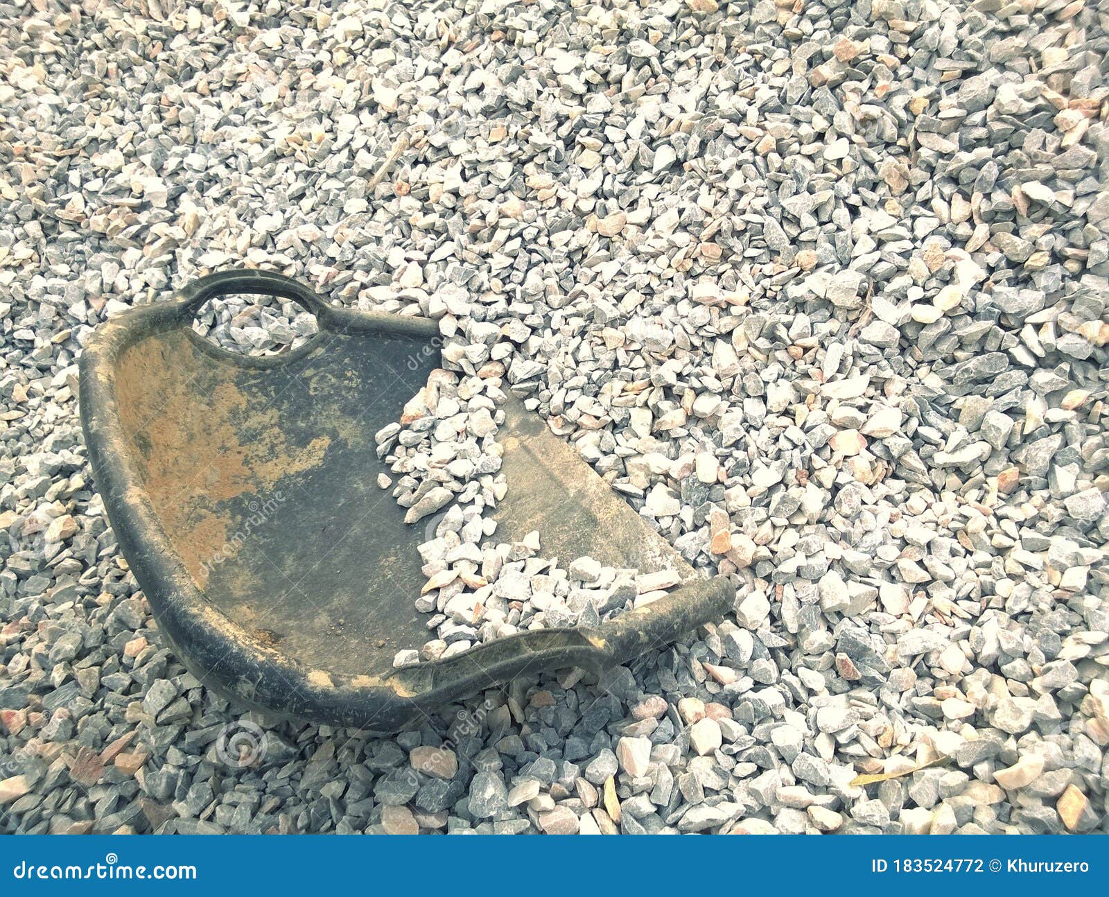 Buckets and pile of rocks stock photo. Image of building - 183524772