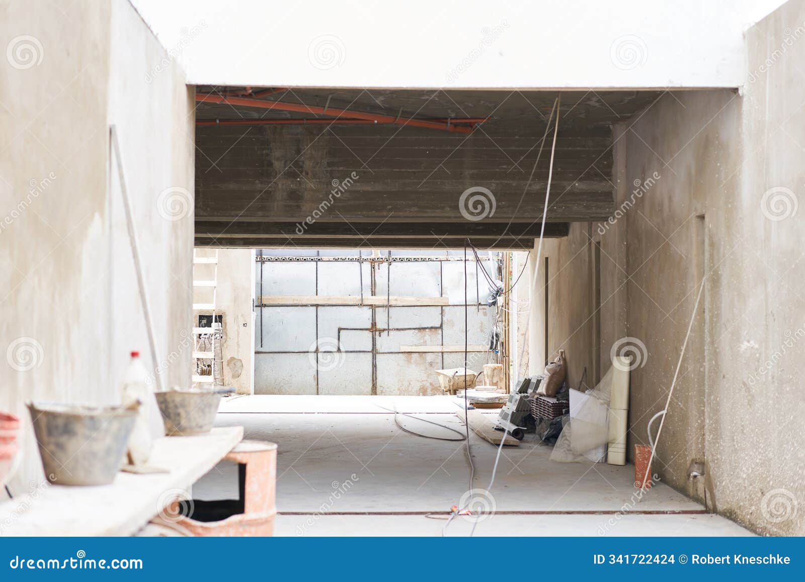 Buckets on Plank by Wall at Incomplete House Construction Site Stock ...