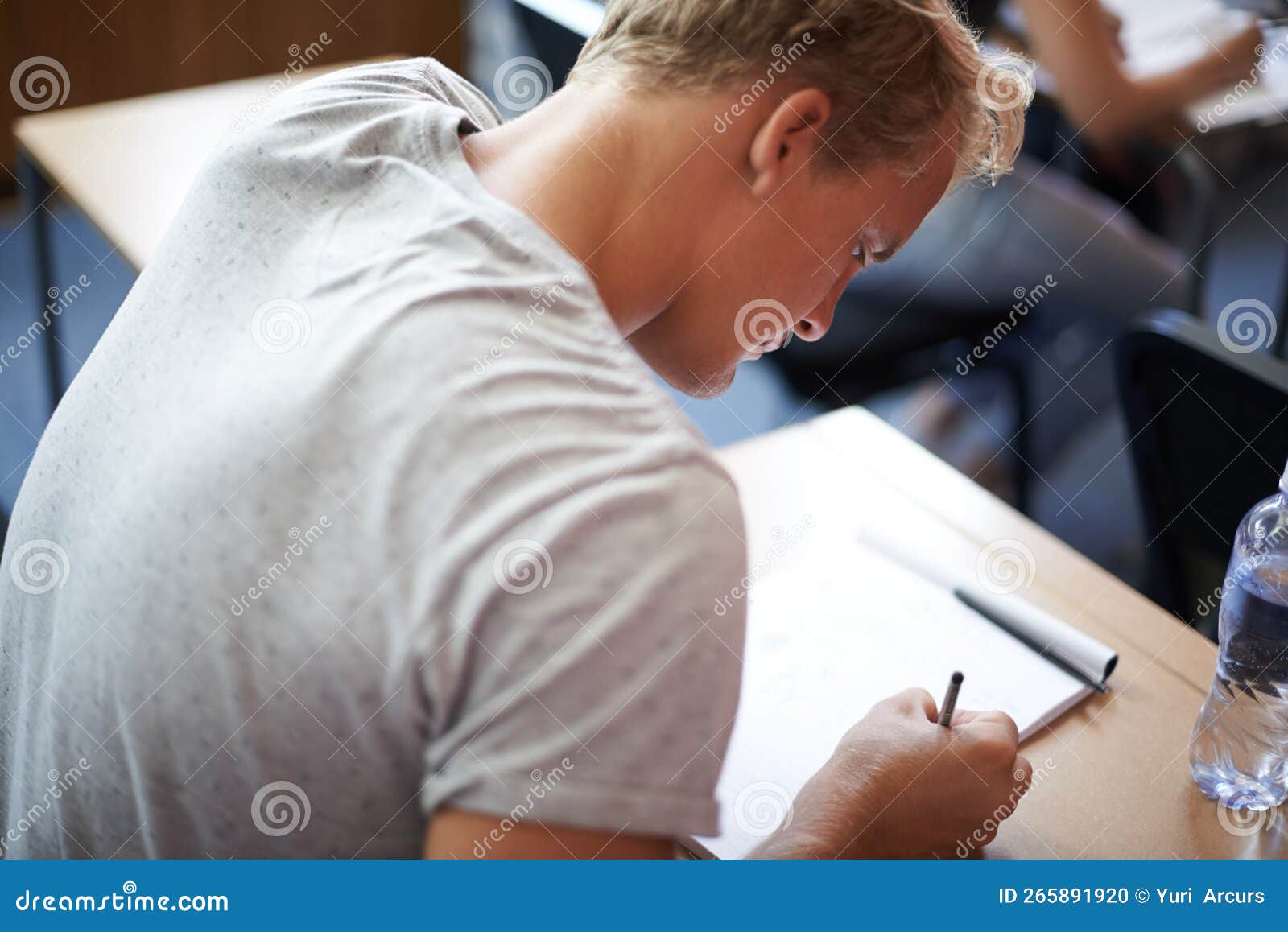 Buckling Down for Long Hard Examination. a Young College Student ...