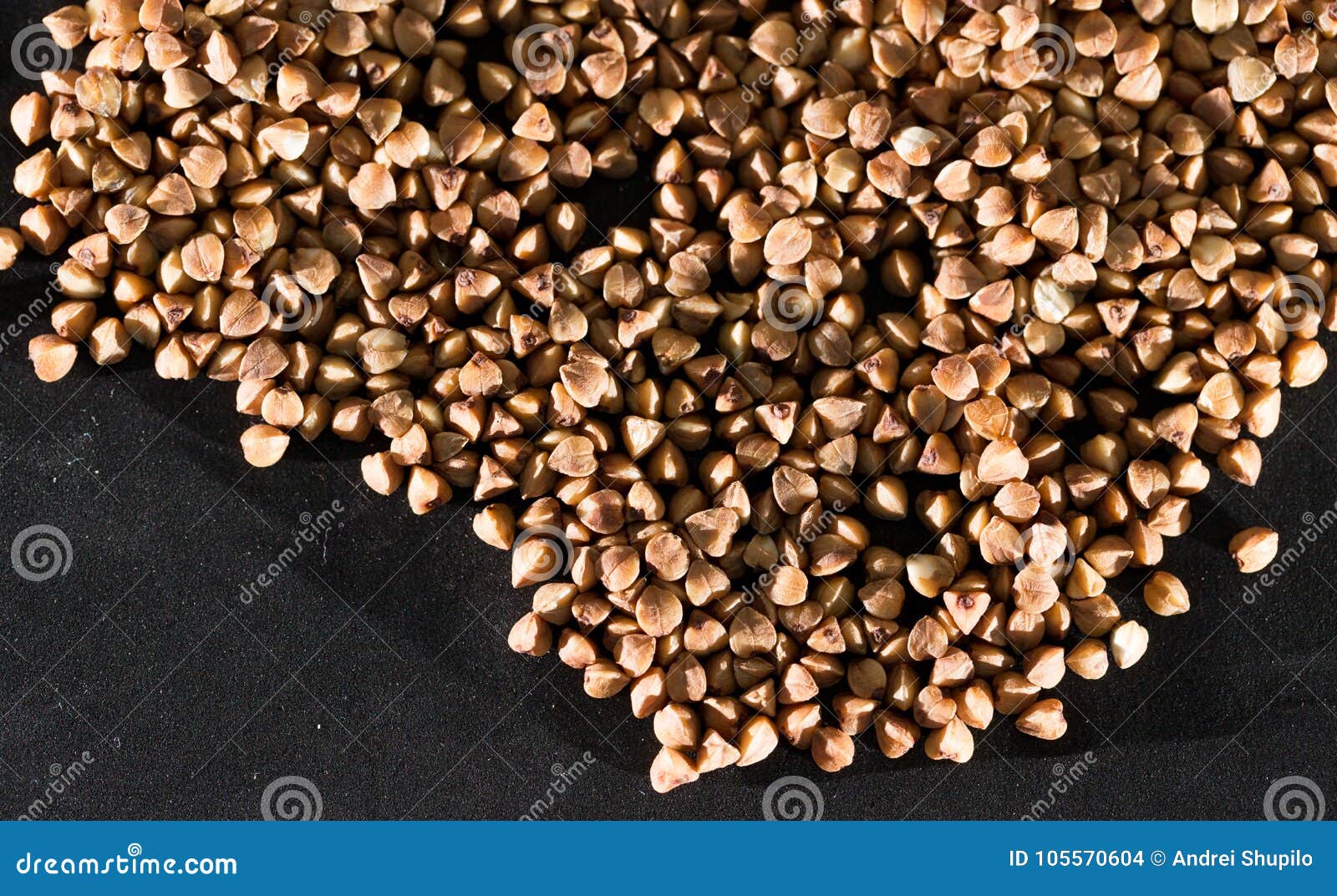 Buckwheat on a Black Background Stock Photo - Image of nutrition, brown ...