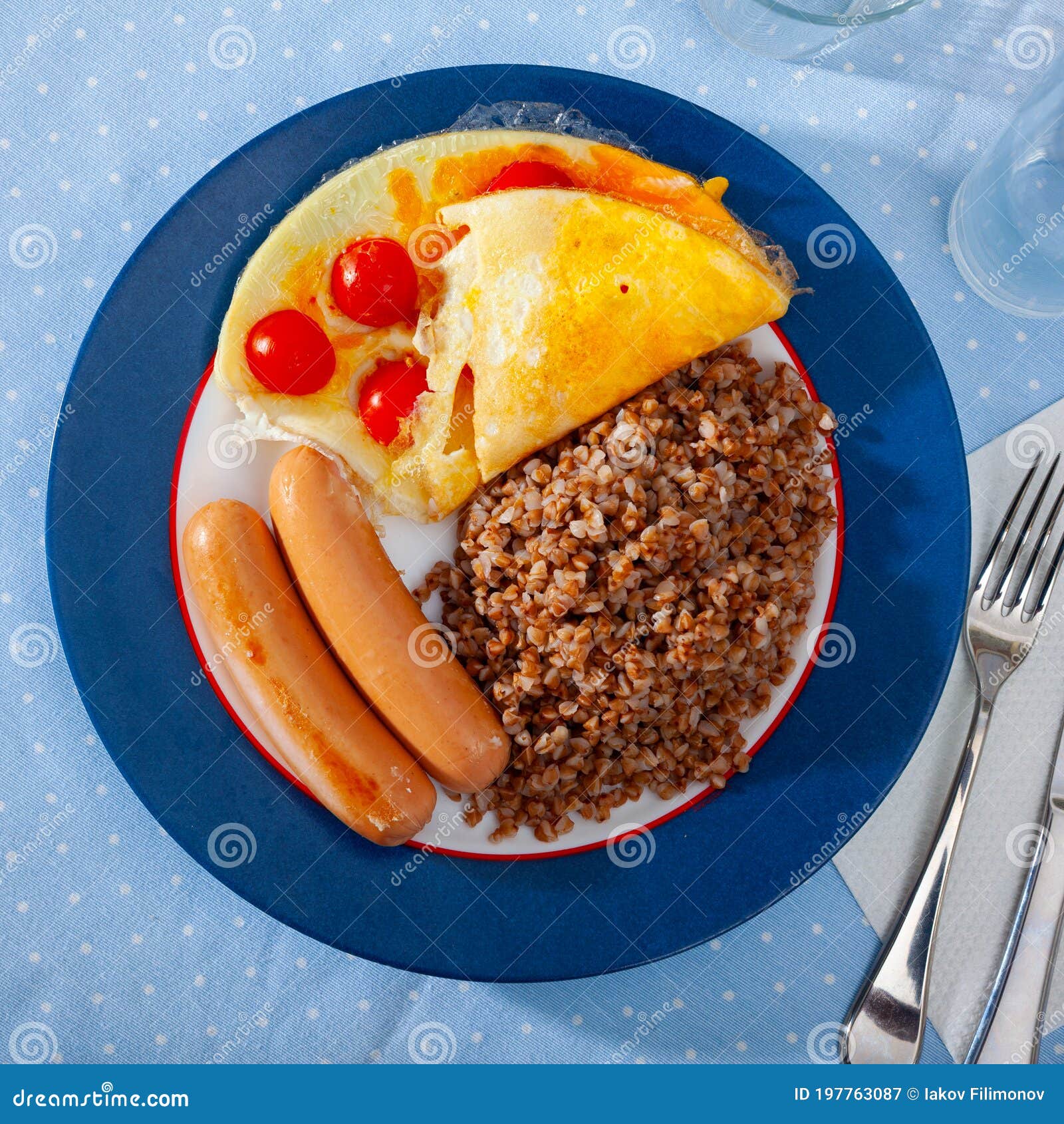 Buckwheat Kasha with Frankfurters and Fried Eggs Stock Image - Image of ...