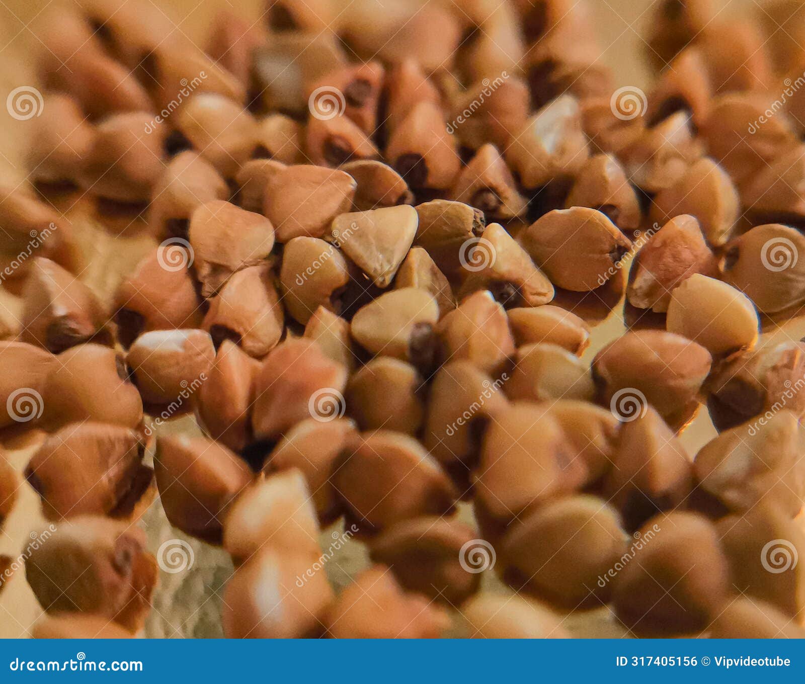 Buckwheat Kernels Close-up on a Golden Surface Stock Photo - Image of ...