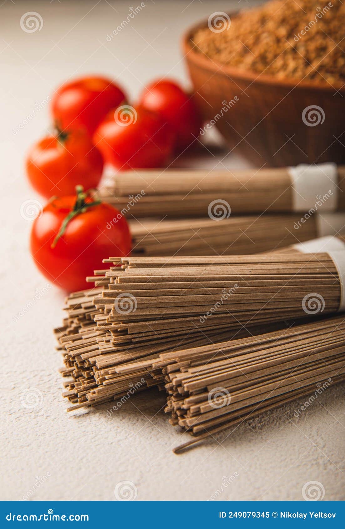 Buckwheat Soba Paste and Cherry Tomatoes on a Textured Background ...