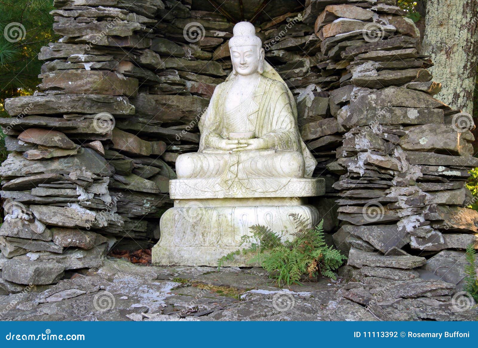 Buddah Statue in Stone Grotto Stock Photo - Image of worship, religion ...
