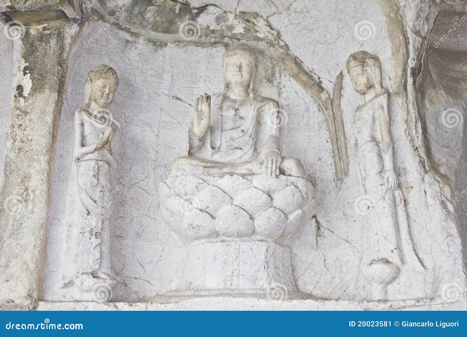 Buddha carved on a rock stock image. Image of asian, carved - 20023581