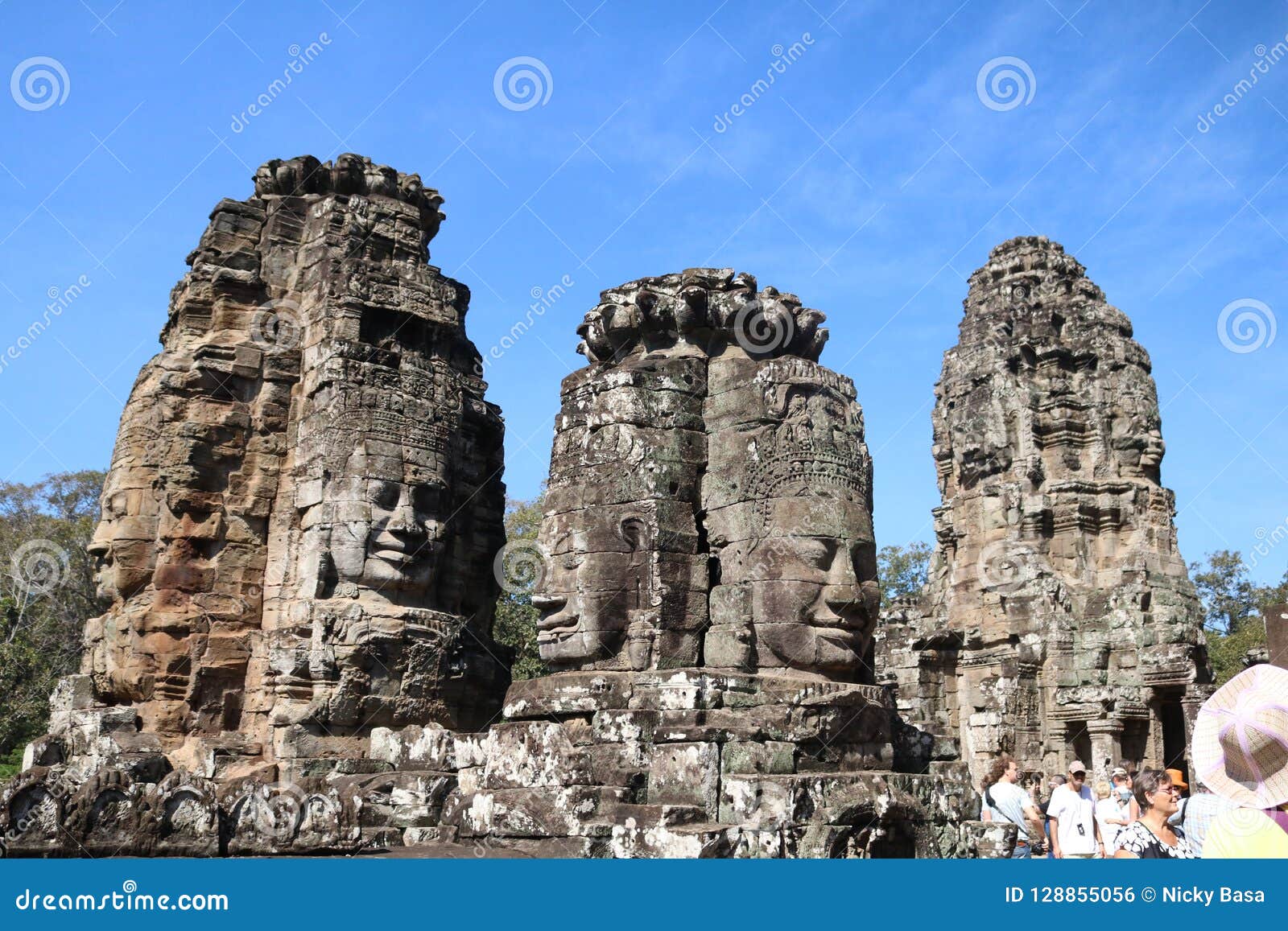 Buddha faces in Angkor Wat editorial photo. Image of angkor - 128855056