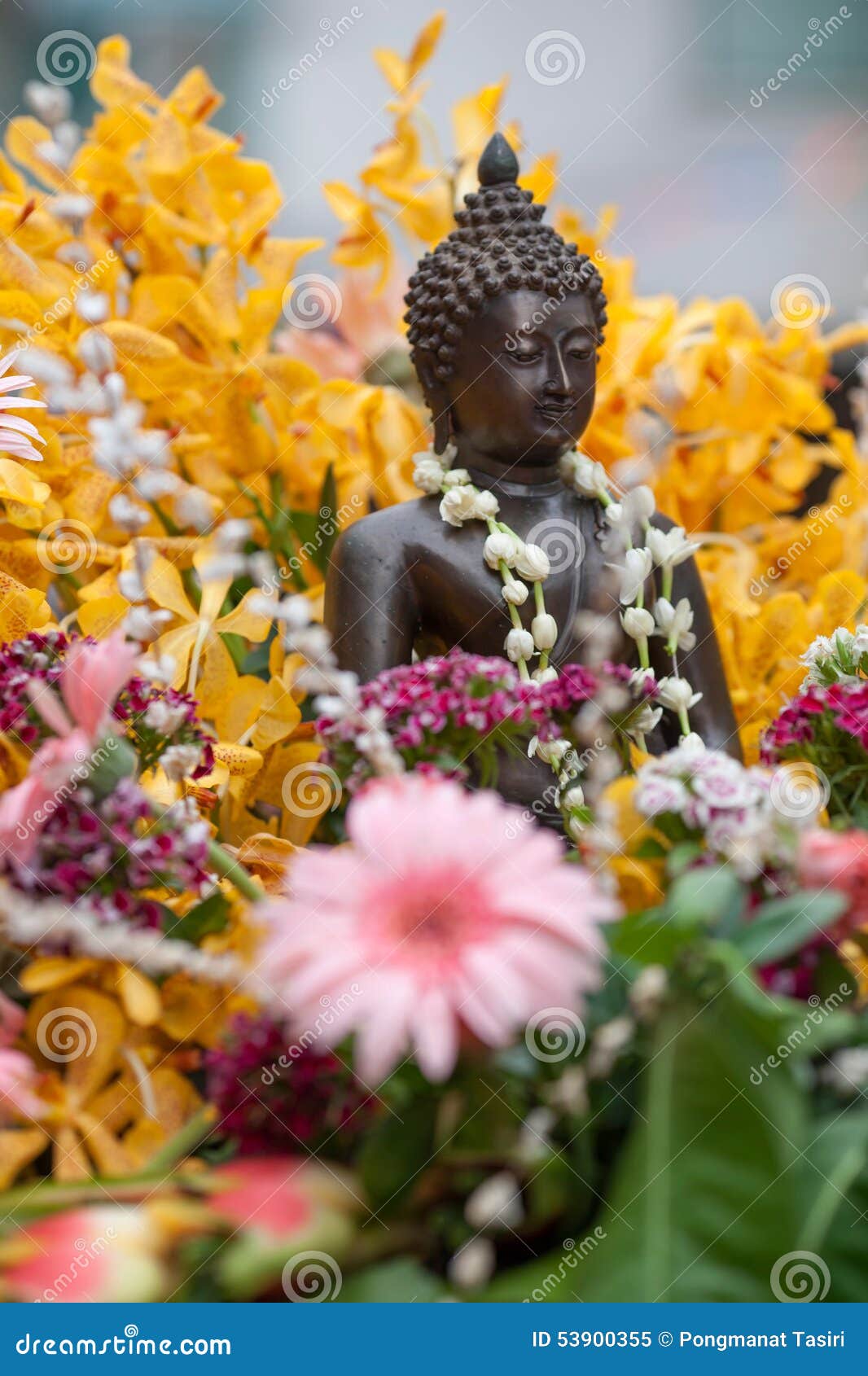 Buddha statue with flower stock image. Image of southeast - 53900355