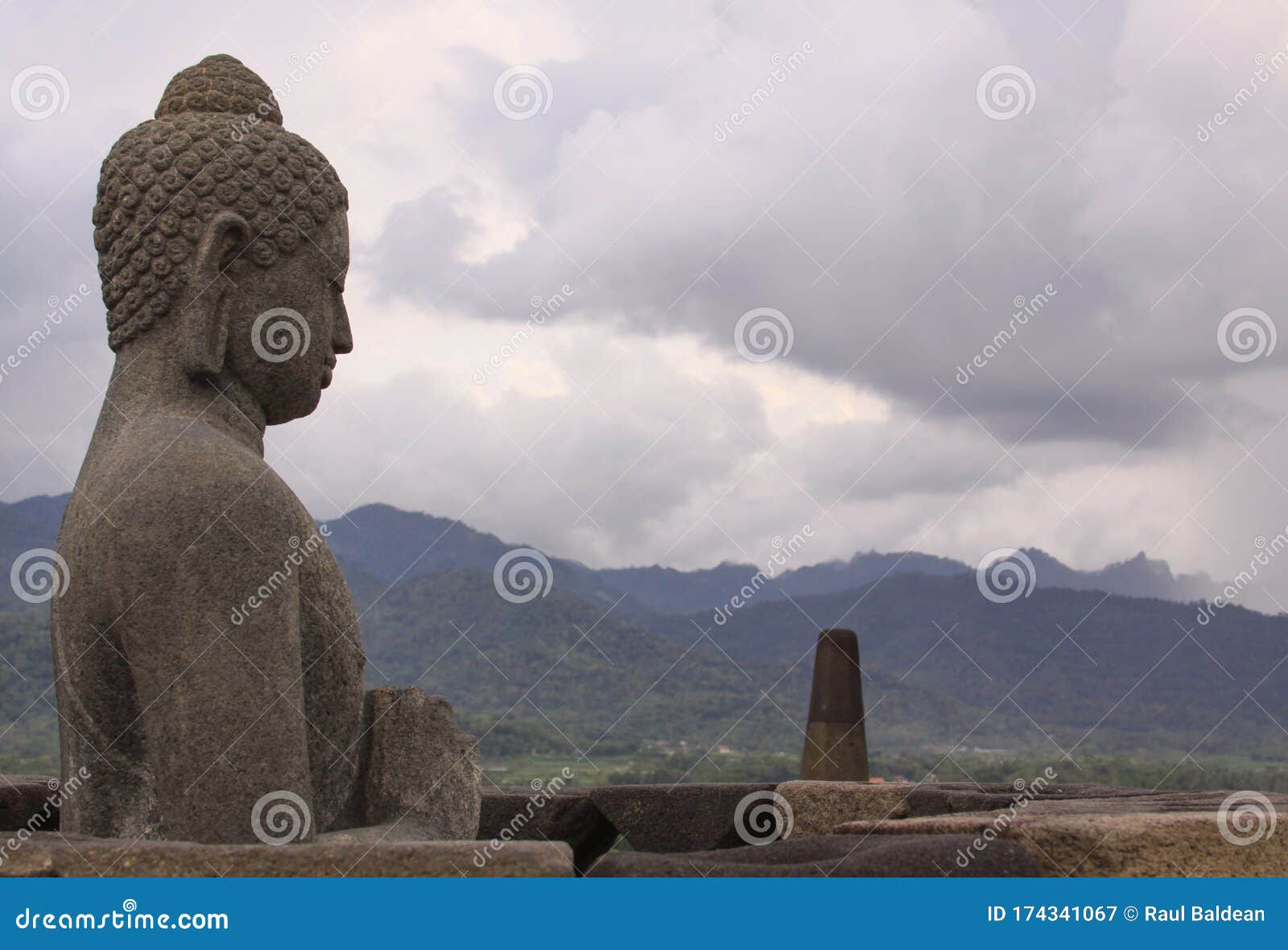 Buddha Statue Overlooking Surroundings at Borobudur Temple at Sunrise ...