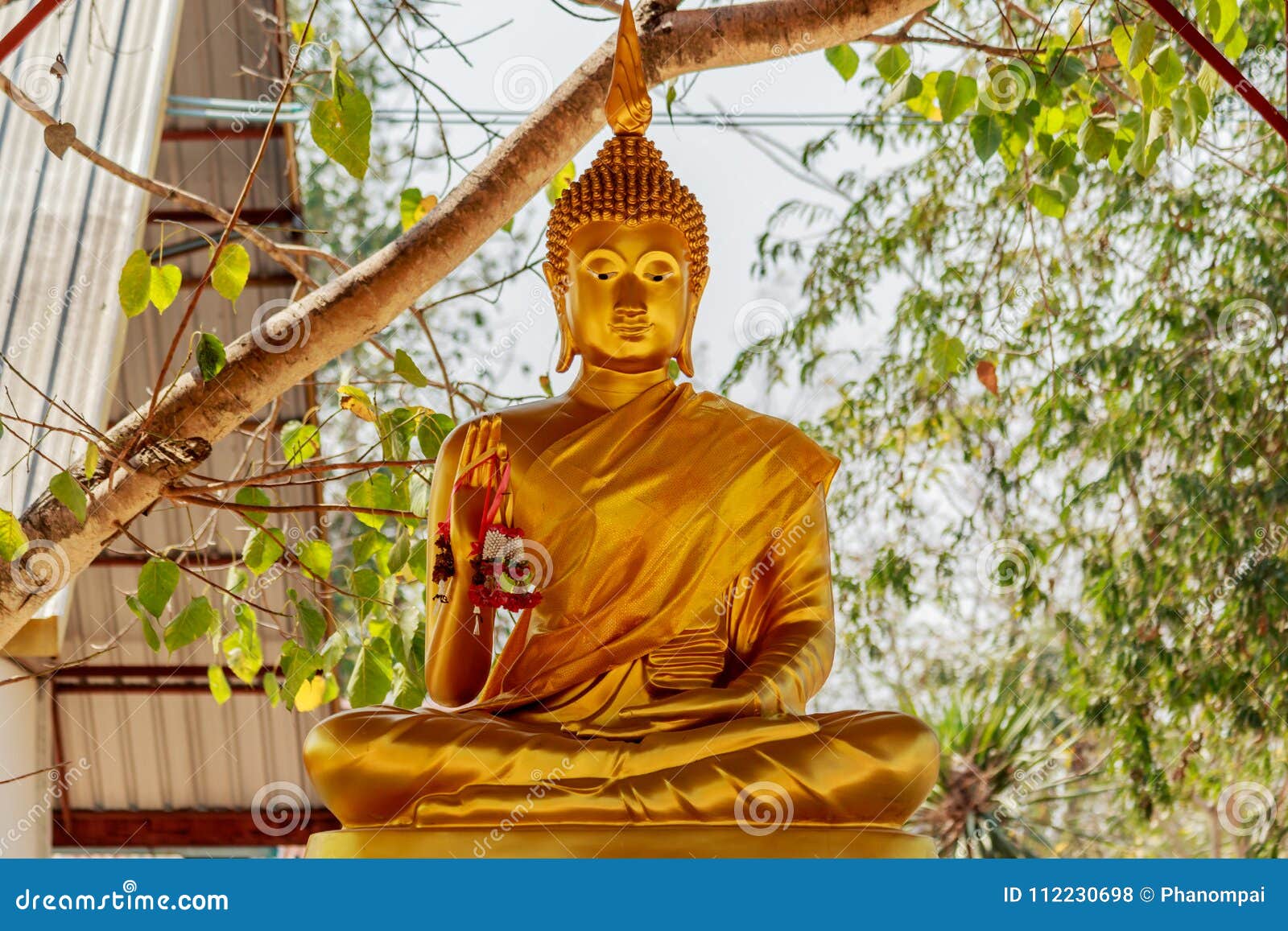 Buddha Statue Sitting Under Bodhi Tree . Stock Photo - Image of ...