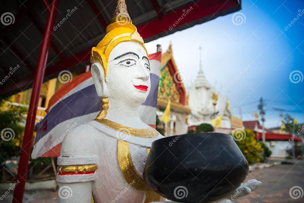Buddhist God Statue with a Pot on His Hands Stock Image - Image of ...