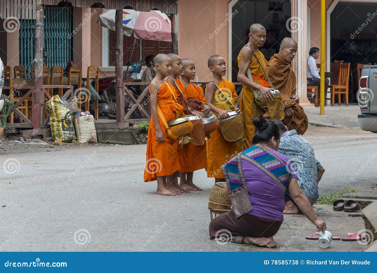 Buddhist monk getting alms editorial stock photo. Image of cambodia ... Buddhist monk getting alms editorial stock photo. Image of cambodia ...