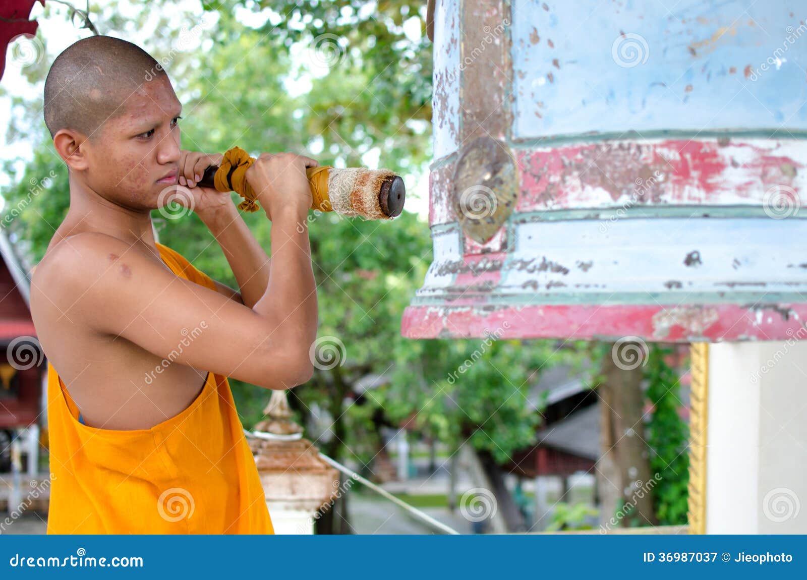Buddhist Monk, Hitting the Bell in the Temple. Stock Image - Image of ...