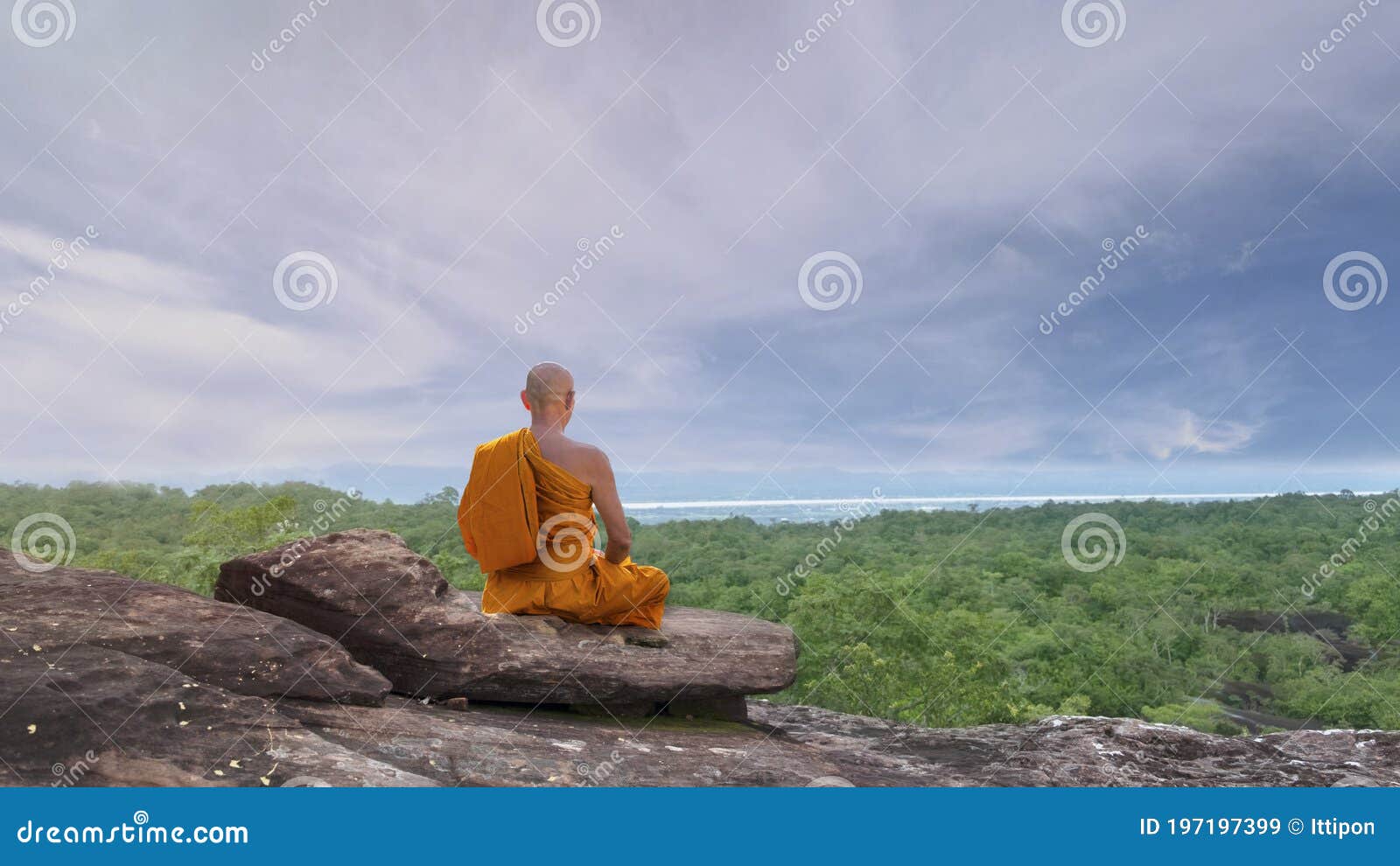 Buddhist Monk Meditating On Mountain
