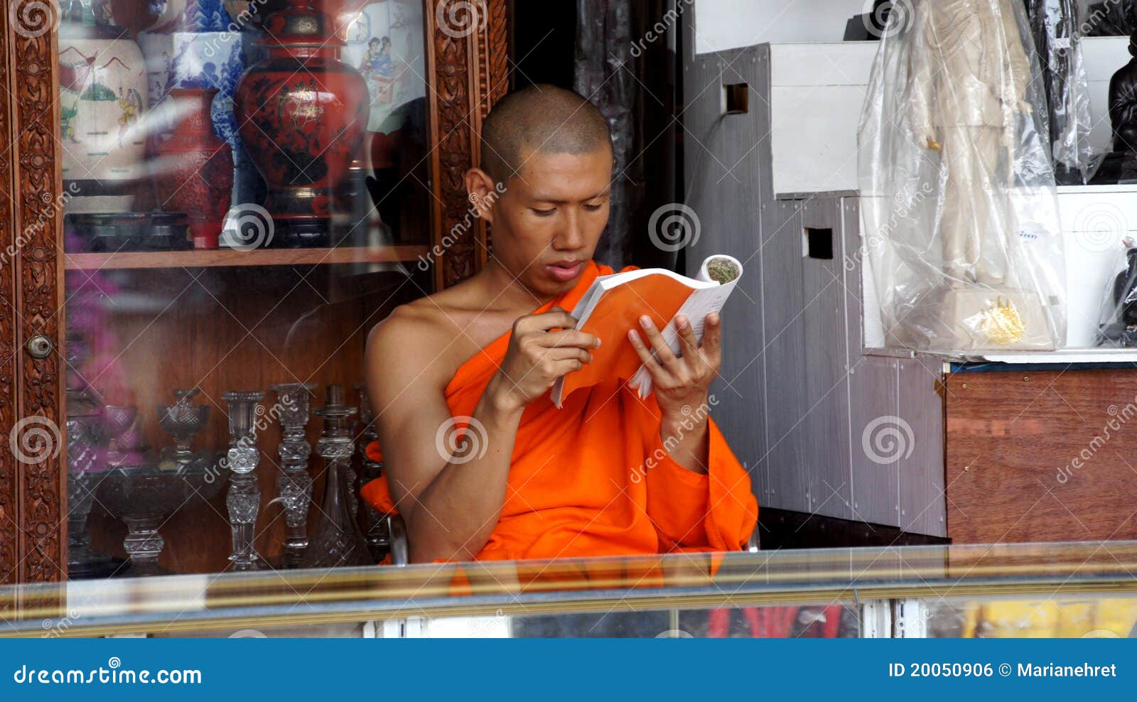 Buddhist Monk is Reading a Book Inside a Shop Editorial Photo - Image ...