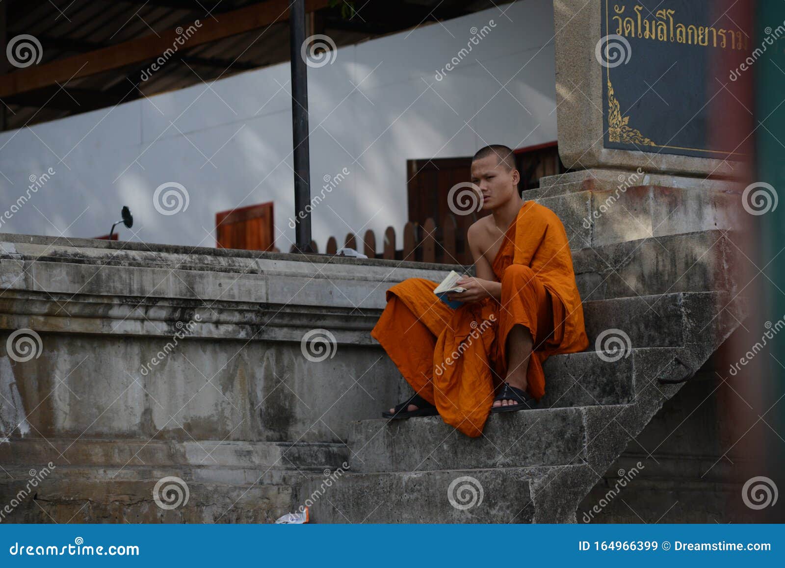 A Buddhist Reading Ancient Scrolls In Sarnath Where Gautama Buddha ...