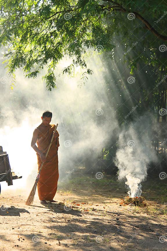 Buddhist Monk Yard Work editorial stock image. Image of religion - 22247524
