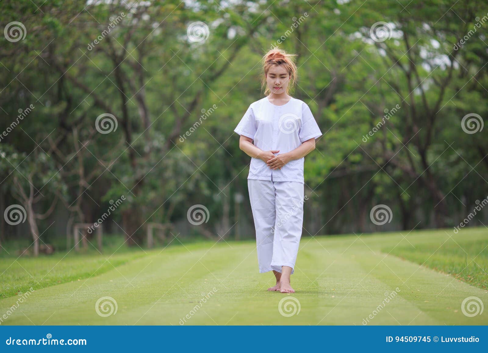 Buddhist Nuns Meditation Walking on the Temple of Thailand Stock Image ...