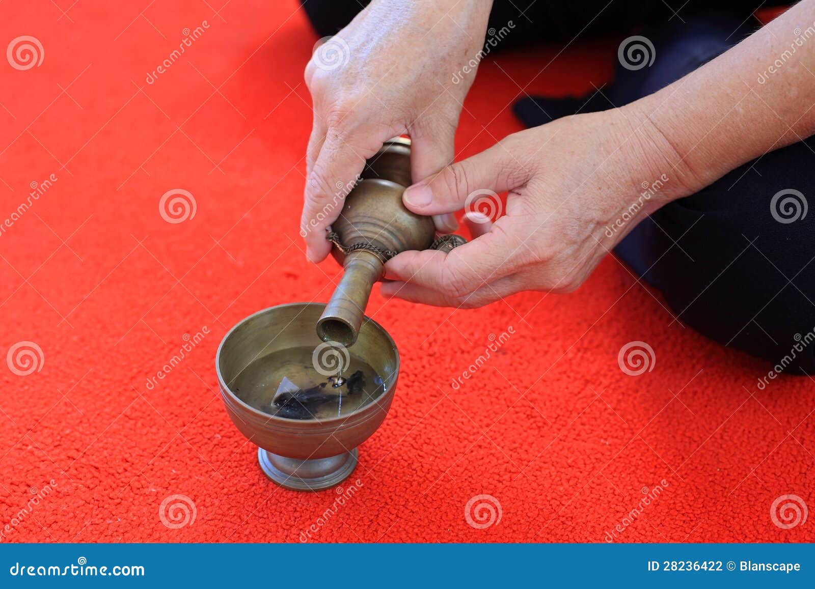 Buddhist S Grail Pouring Water into Container Stock Photo - Image of ...
