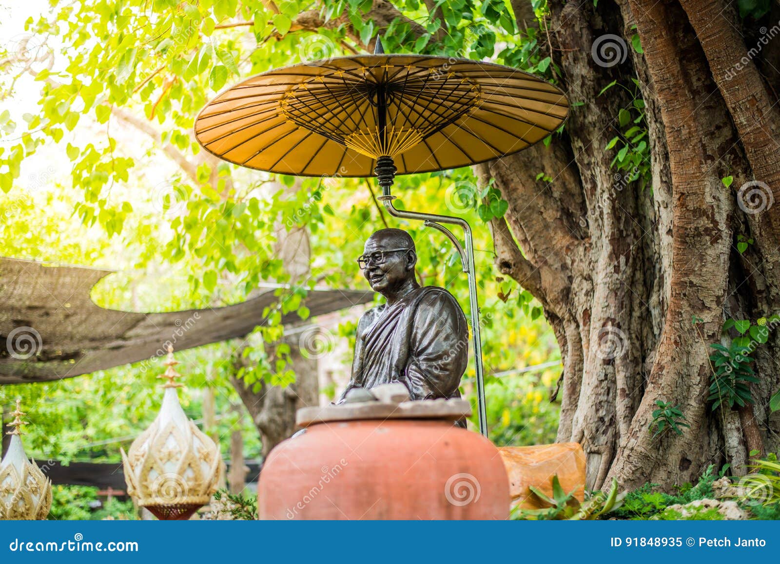 Buddhist Statue Meditating Under Big Tree. Stock Image - Image of ...