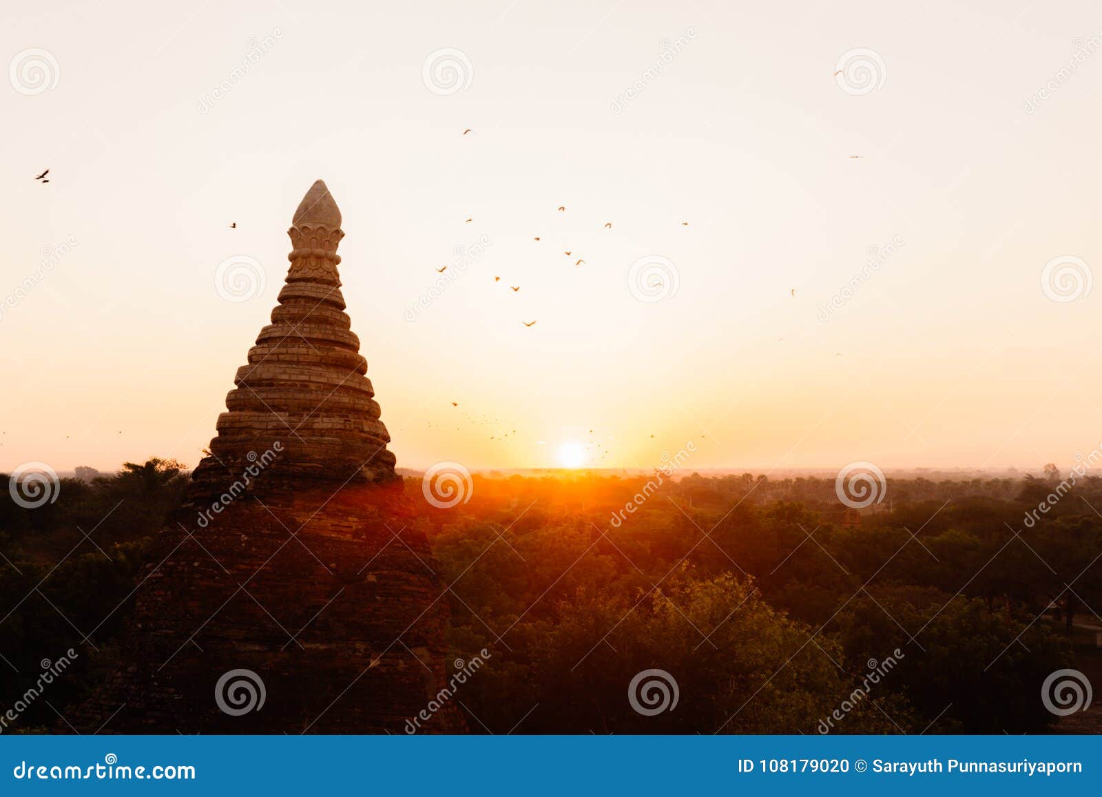 Buddhist Temple Shape Against Sun Light during Sunrise. Stock Photo ...