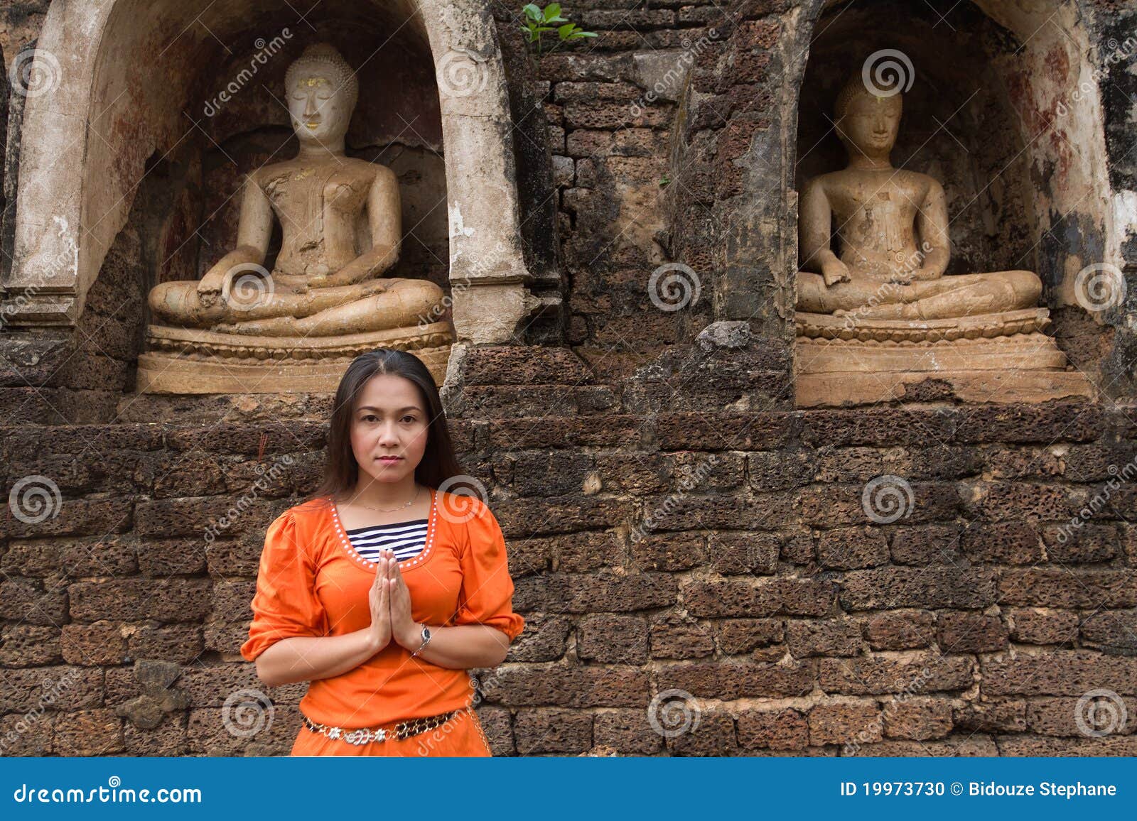 Buddhist woman praying stock photo. Image of outdoors - 19973730