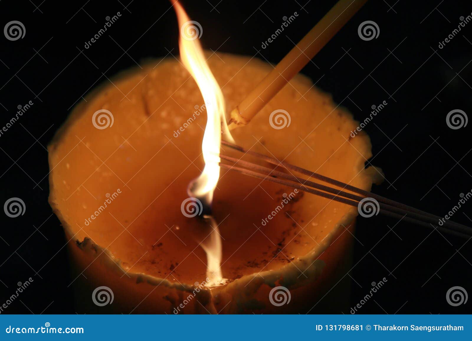 Buddhists Make Merit,Placing a Lighted Candle and Lit Incense with ...