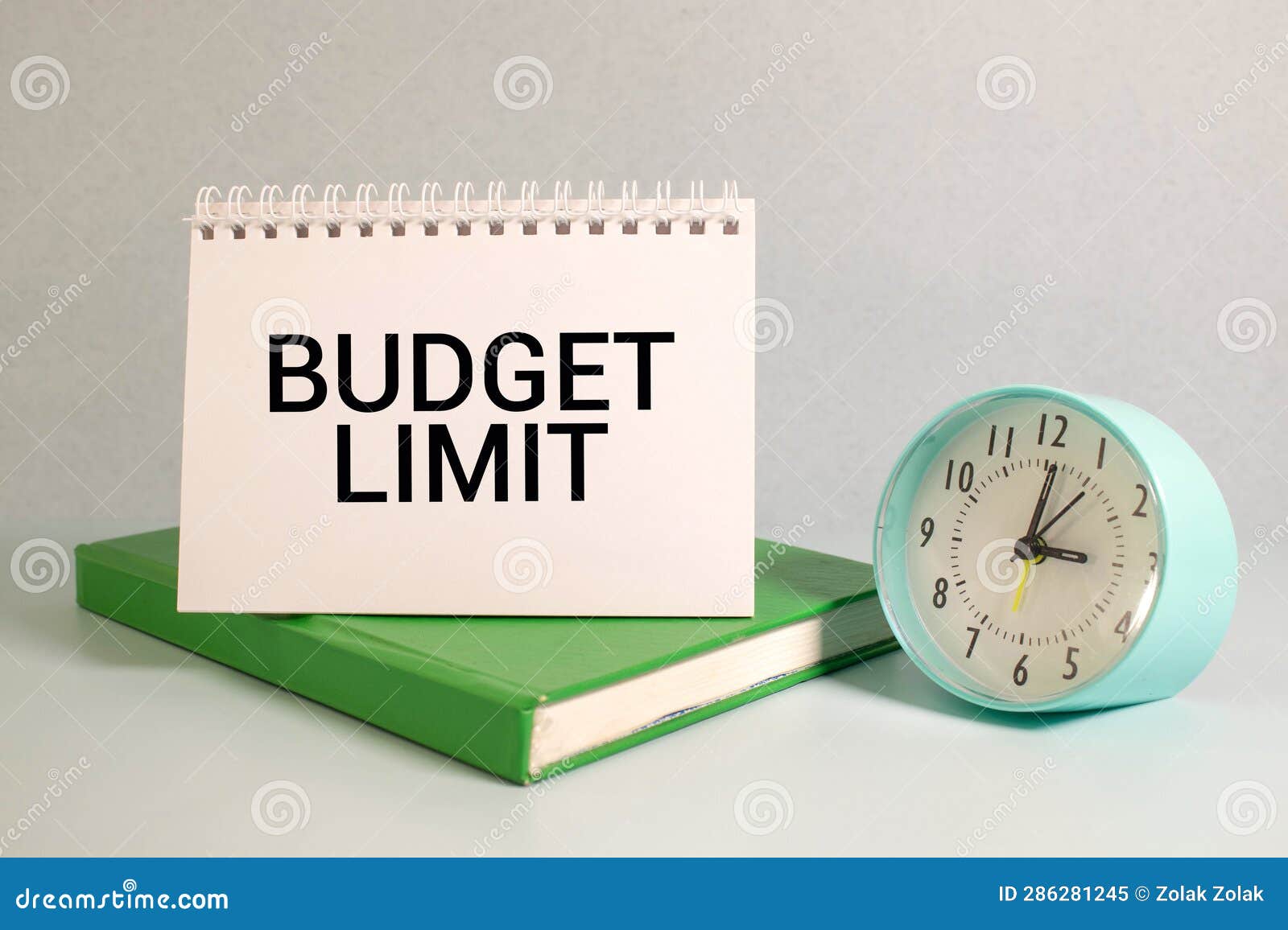 BUDGET LIMIT Text on the Page on the Envelope. on the Work Table Stock ...